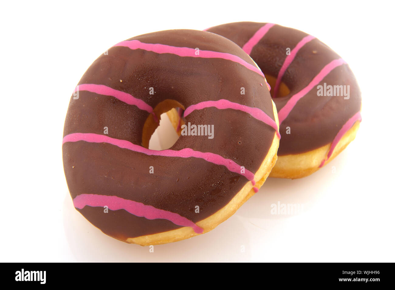 Pink striped donuts with chocolat isolated over white Stock Photo - Alamy