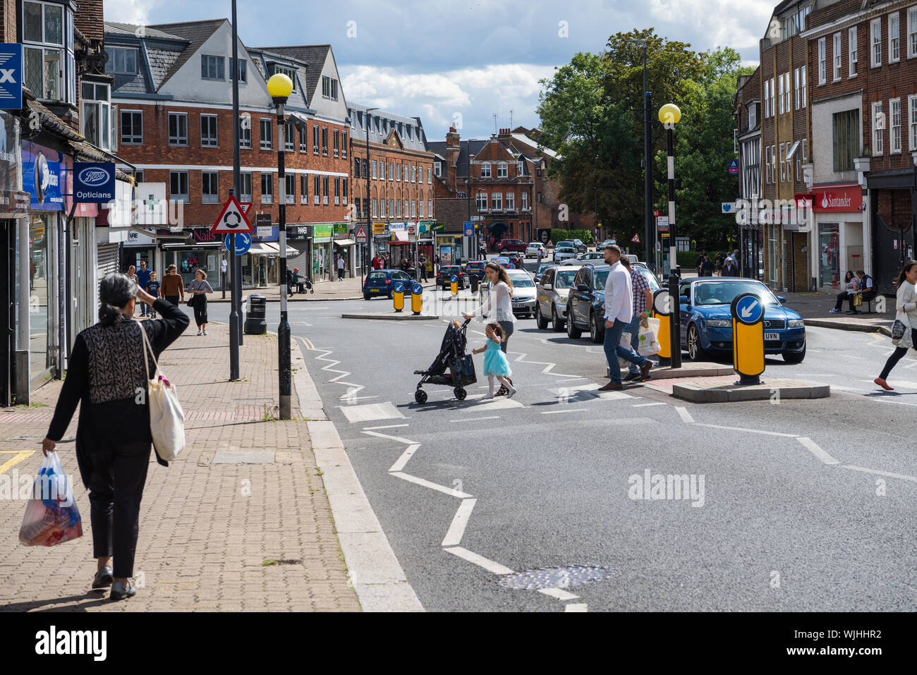 People out and about and shopping in Bridge Street, Pinner, Middlesex ...