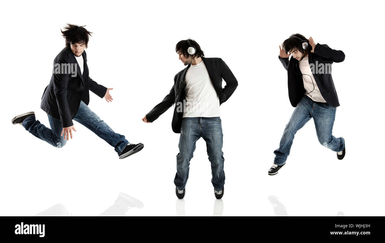 Young modern man dancing over a white background Stock Photo - Alamy
