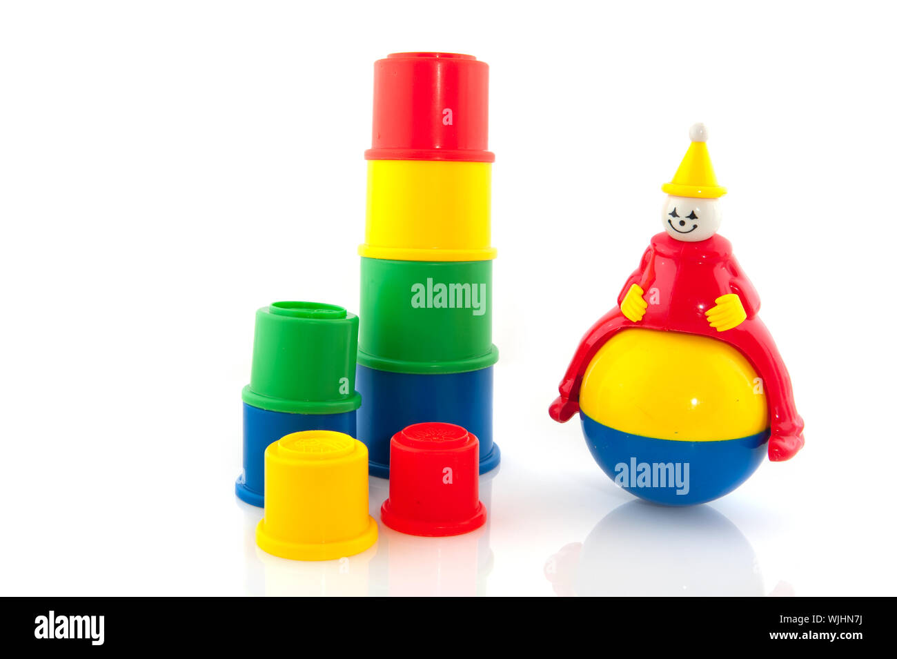 Blocs for building a colorful tower and funny clown Stock Photo - Alamy