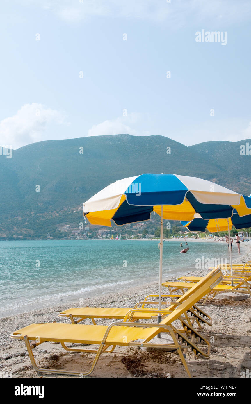 Relaxation beds at the Greek beach Stock Photo - Alamy