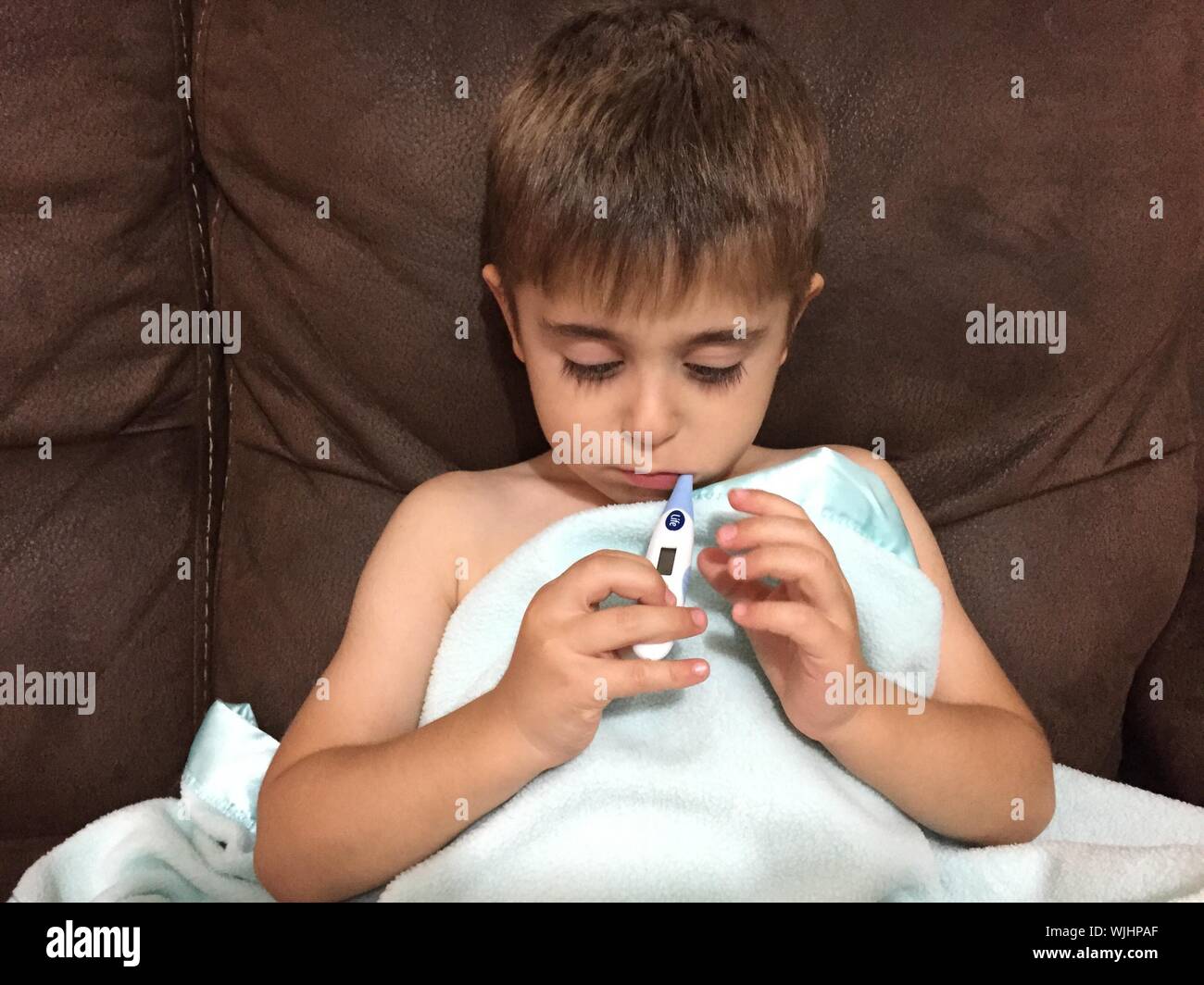 Home thermometer child hi-res stock photography and images - Alamy