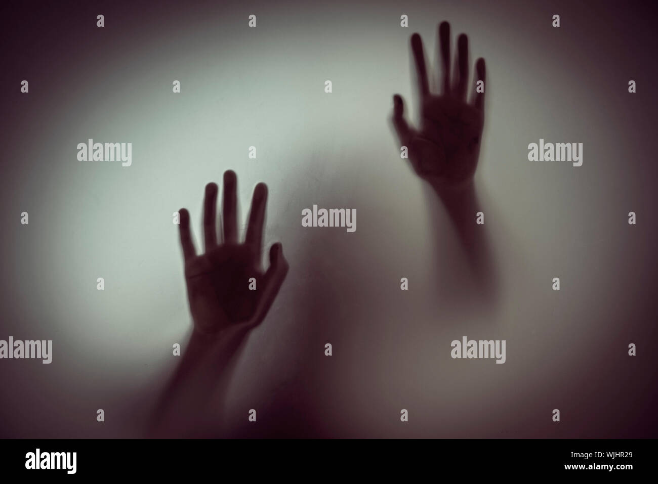Hand touching frosted glass hi-res stock photography and images - Alamy
