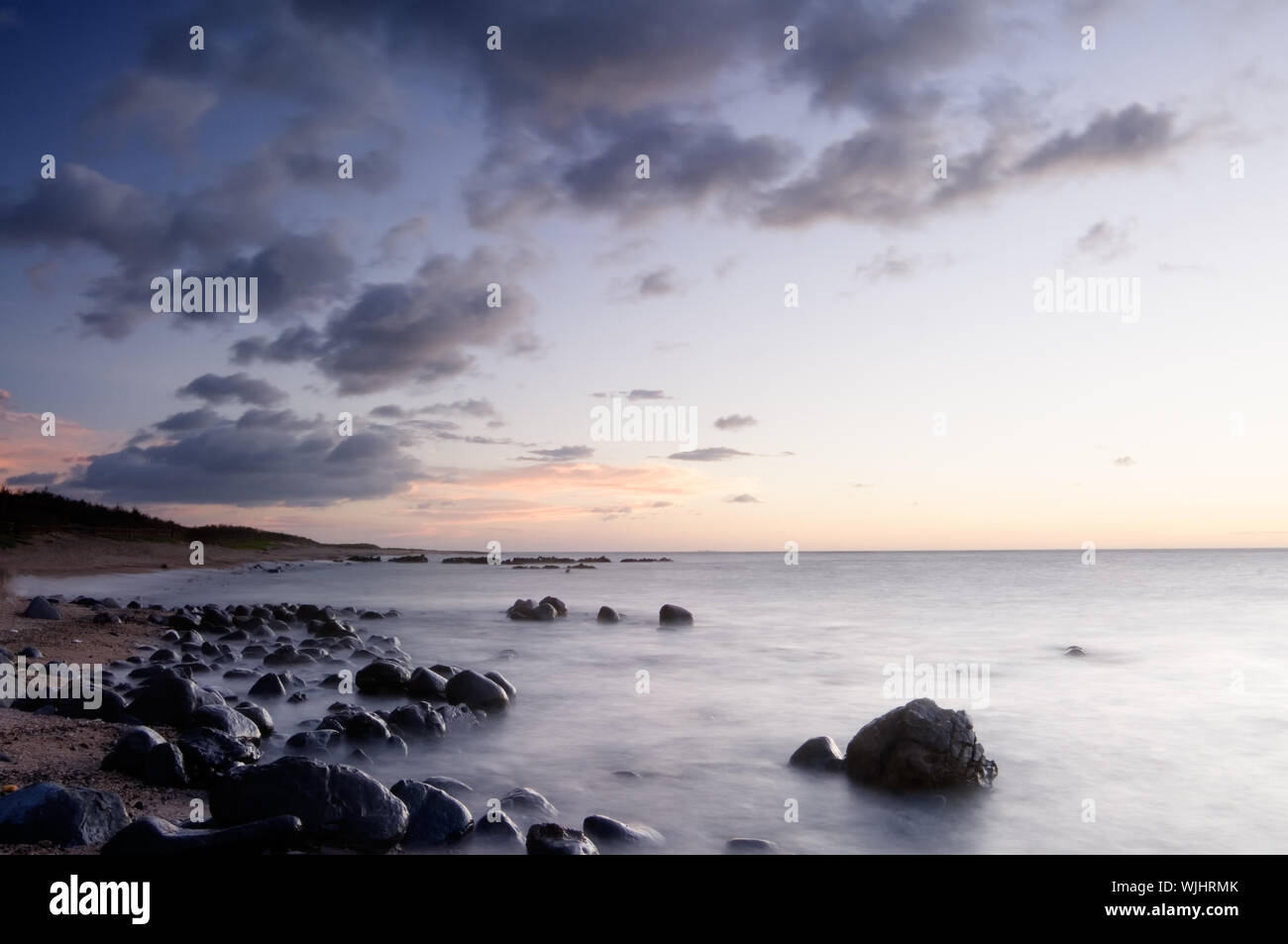 It is sunset of beautiful coral reef coastline Stock Photo - Alamy