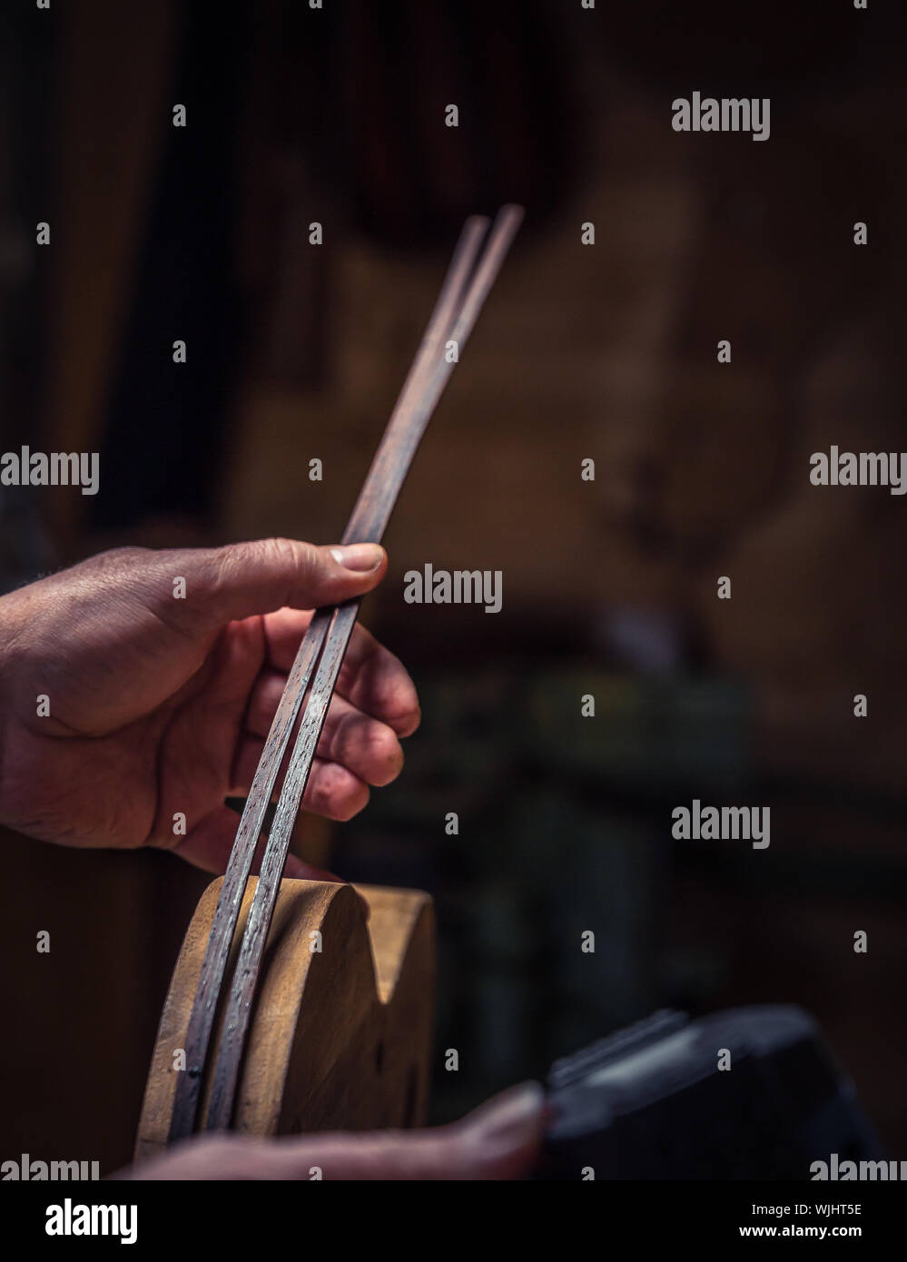 Sticks in hand hi-res stock photography and images - Alamy