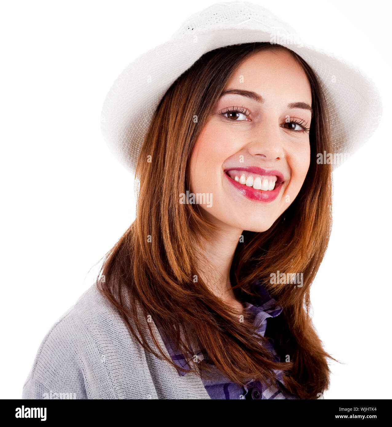 Young smiling face model wearing hat on a white background Stock Photo ...