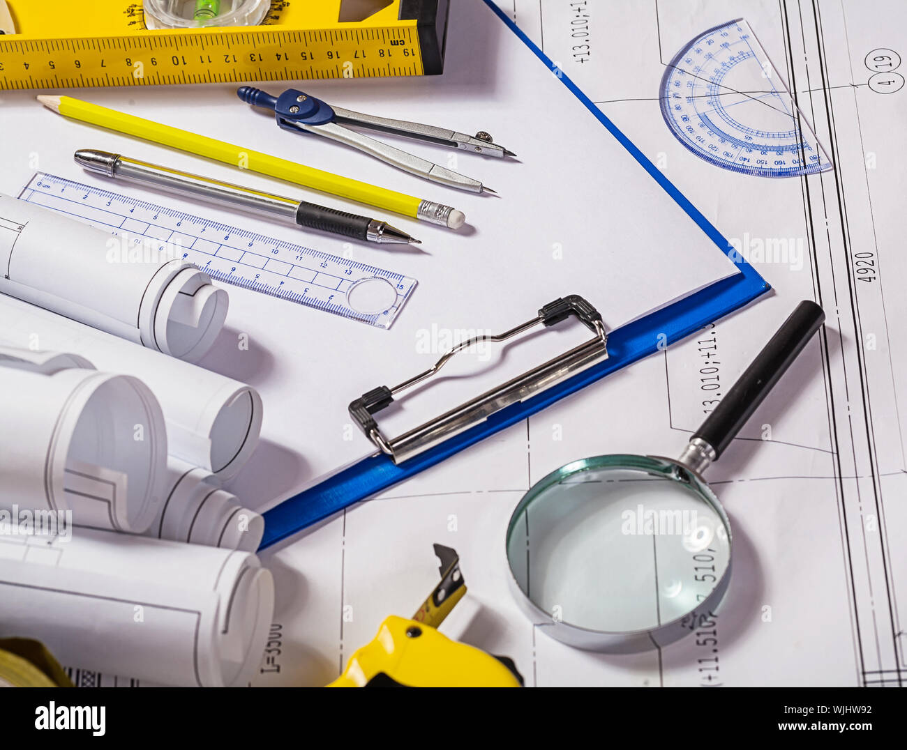 architect tools on blueprint Stock Photo - Alamy