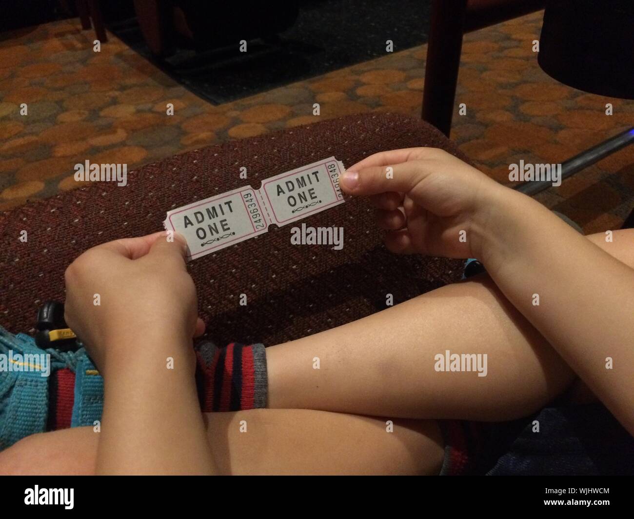 Person holding movie ticket hi-res stock photography and images - Alamy