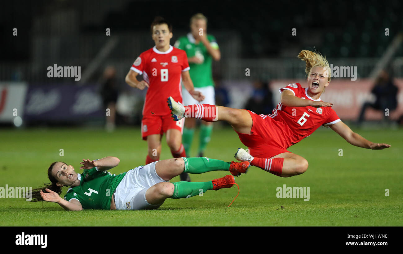 Wales' Elise Hughes is tackled by Northern Ireland's Sarah McFadden ...