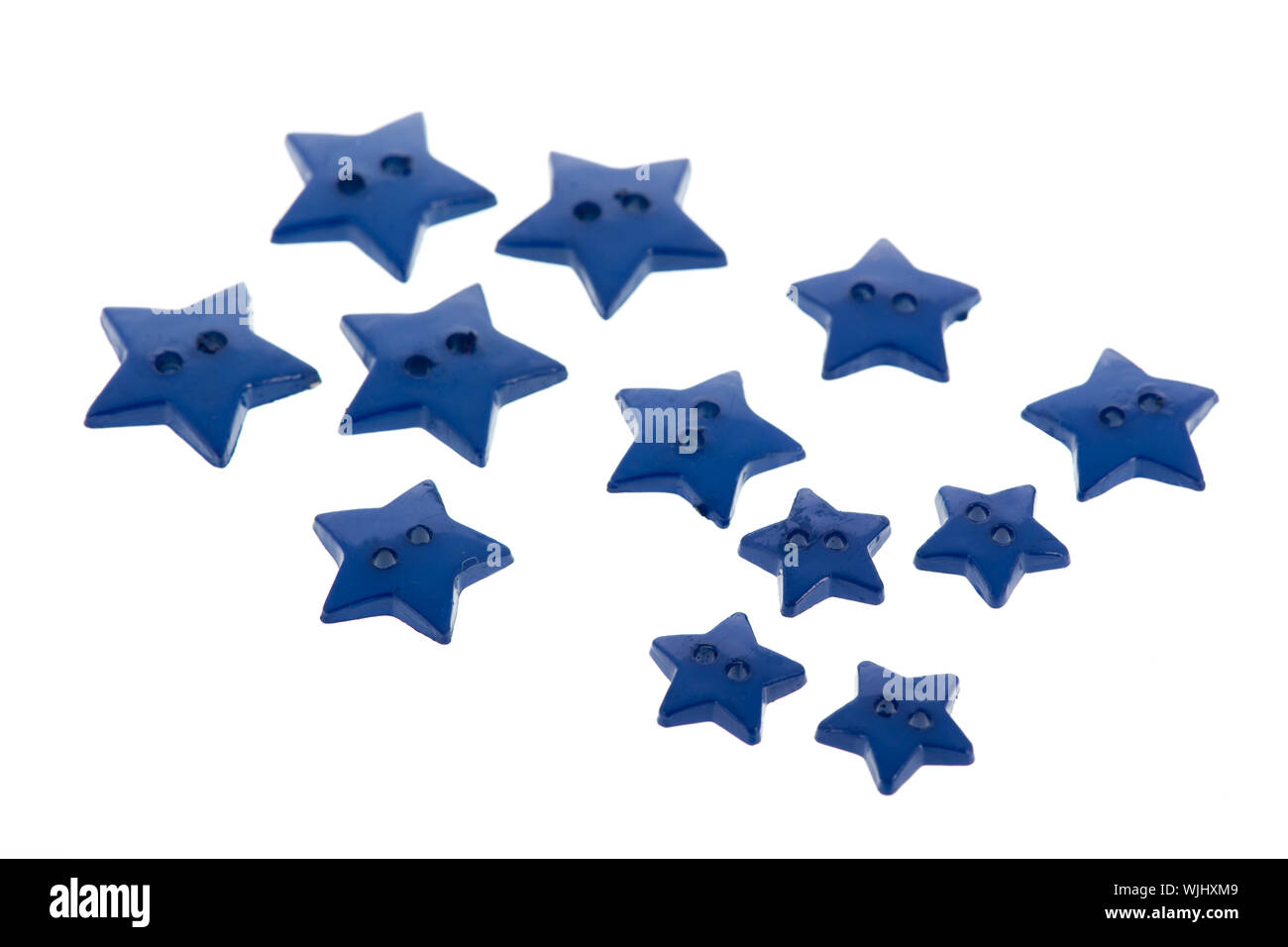 Several blue buttons in star shape isolated over white background Stock ...