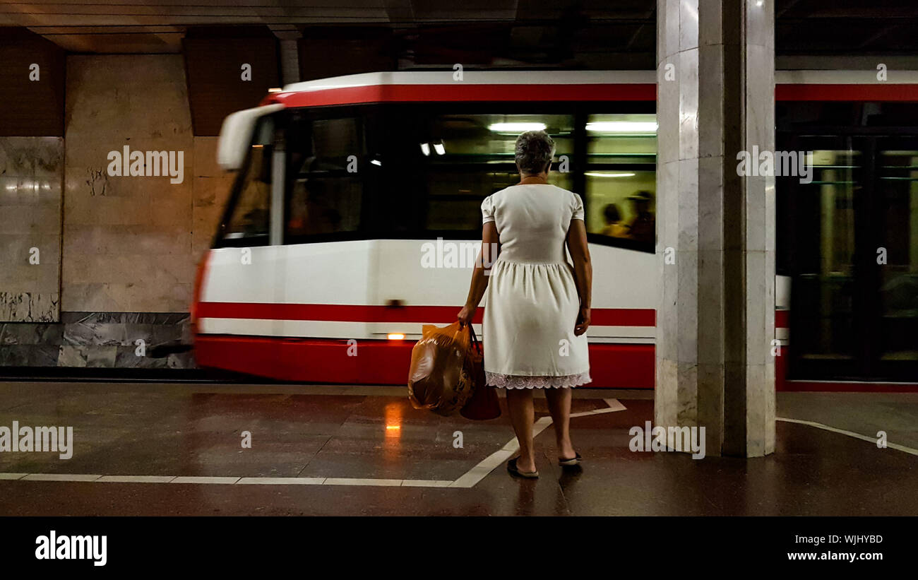 Standing on bus hi-res stock photography and images - Alamy