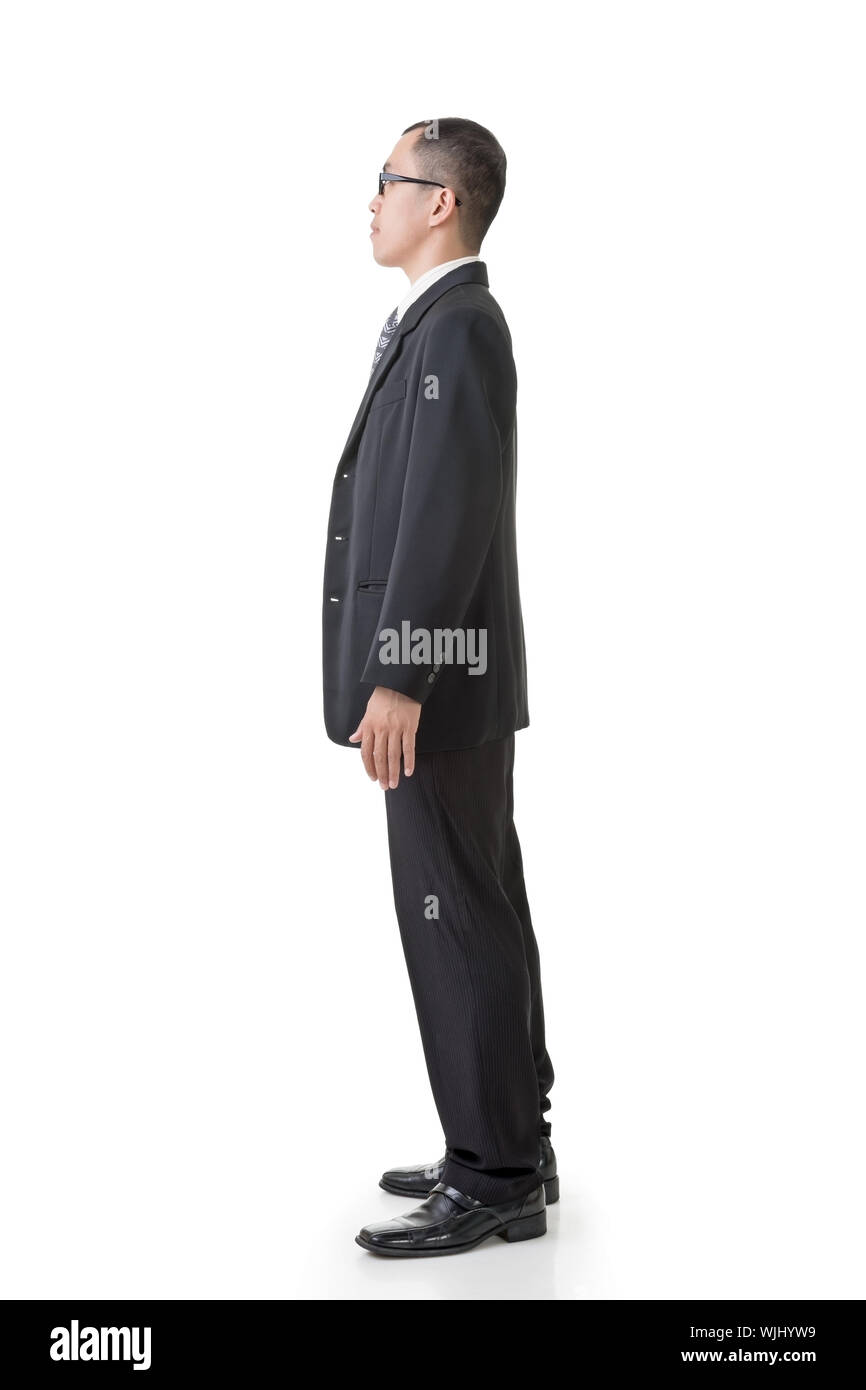 Confident Asian businessman, side view and full length portrait ...