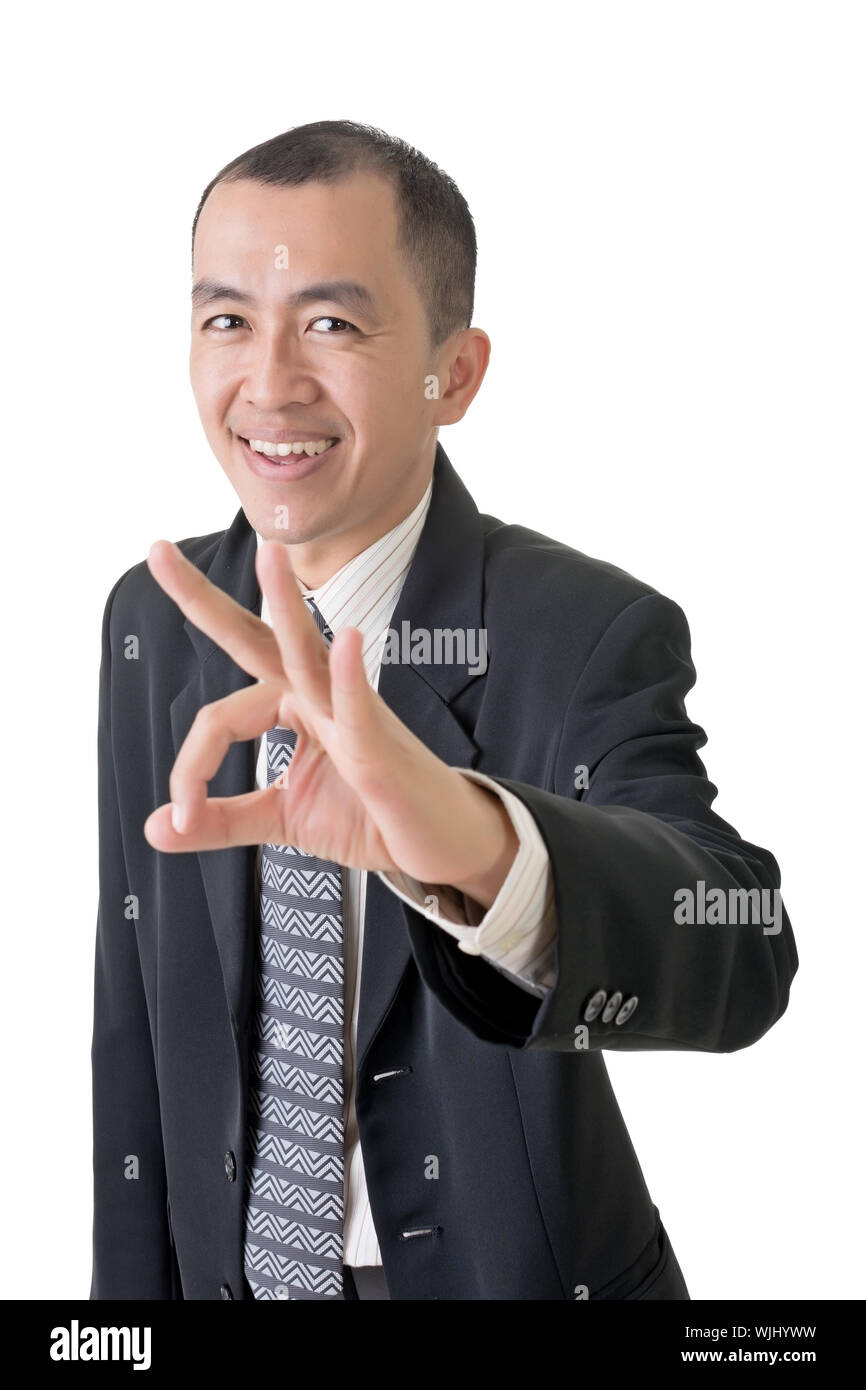 Mature businessman give you a gesture of okay, closeup portrait on ...