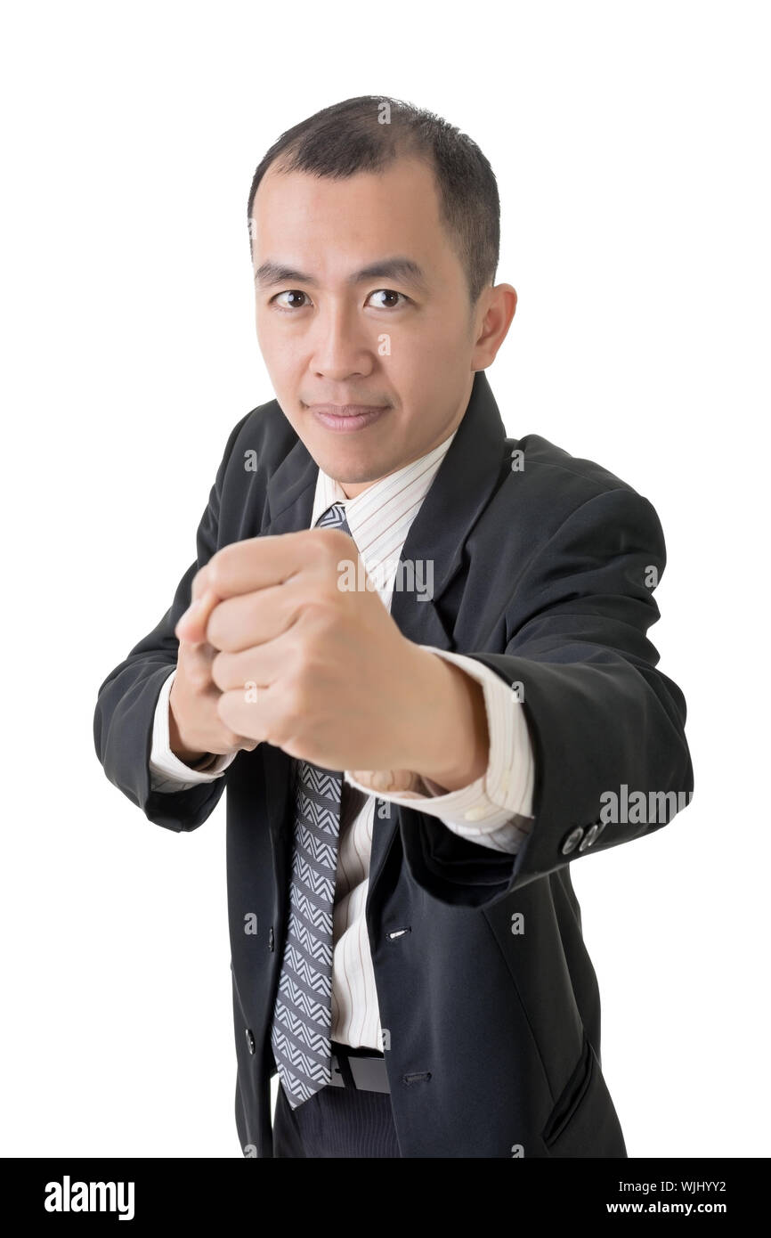 Confident businessman fighting, closeup portrait on white background ...