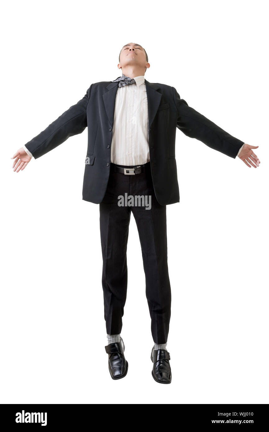 Asian business man flying isolated on white background Stock Photo - Alamy