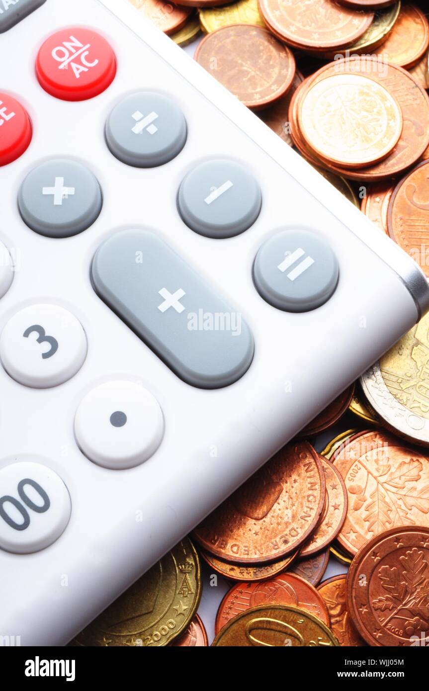 budget calculation or accounting concept with calculator and money ...