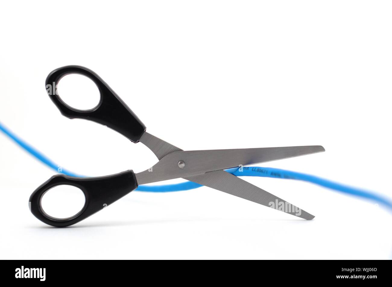 network cable and scissors isolated on white background Stock Photo - Alamy