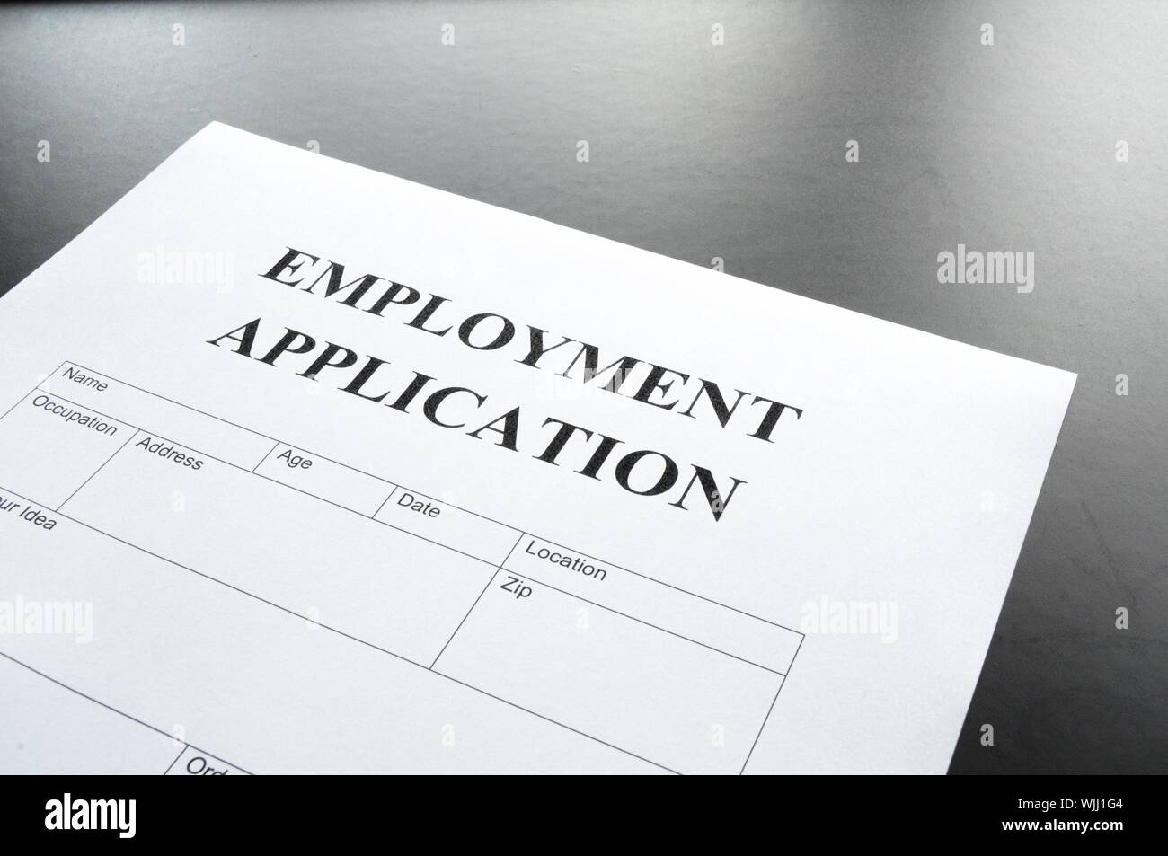 employment application form on desk showing job search concept Stock ...