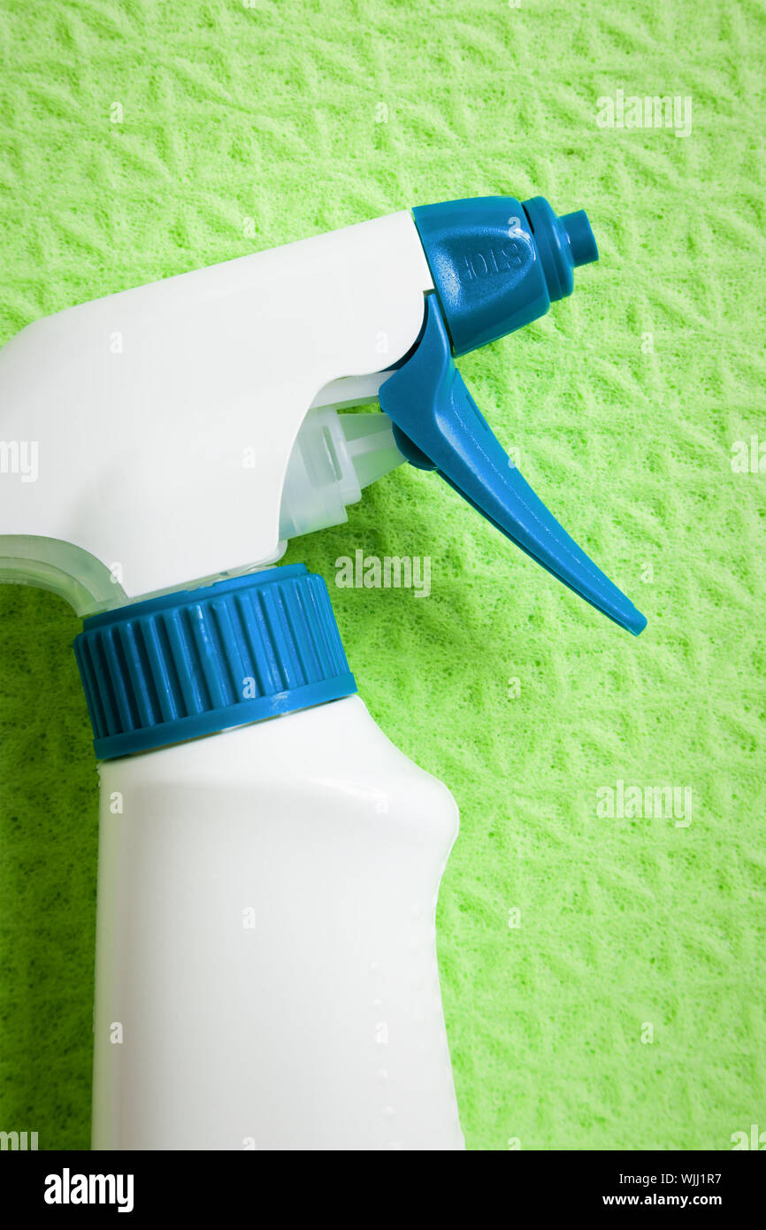 An image of a spray on a green sponge background Stock Photo - Alamy
