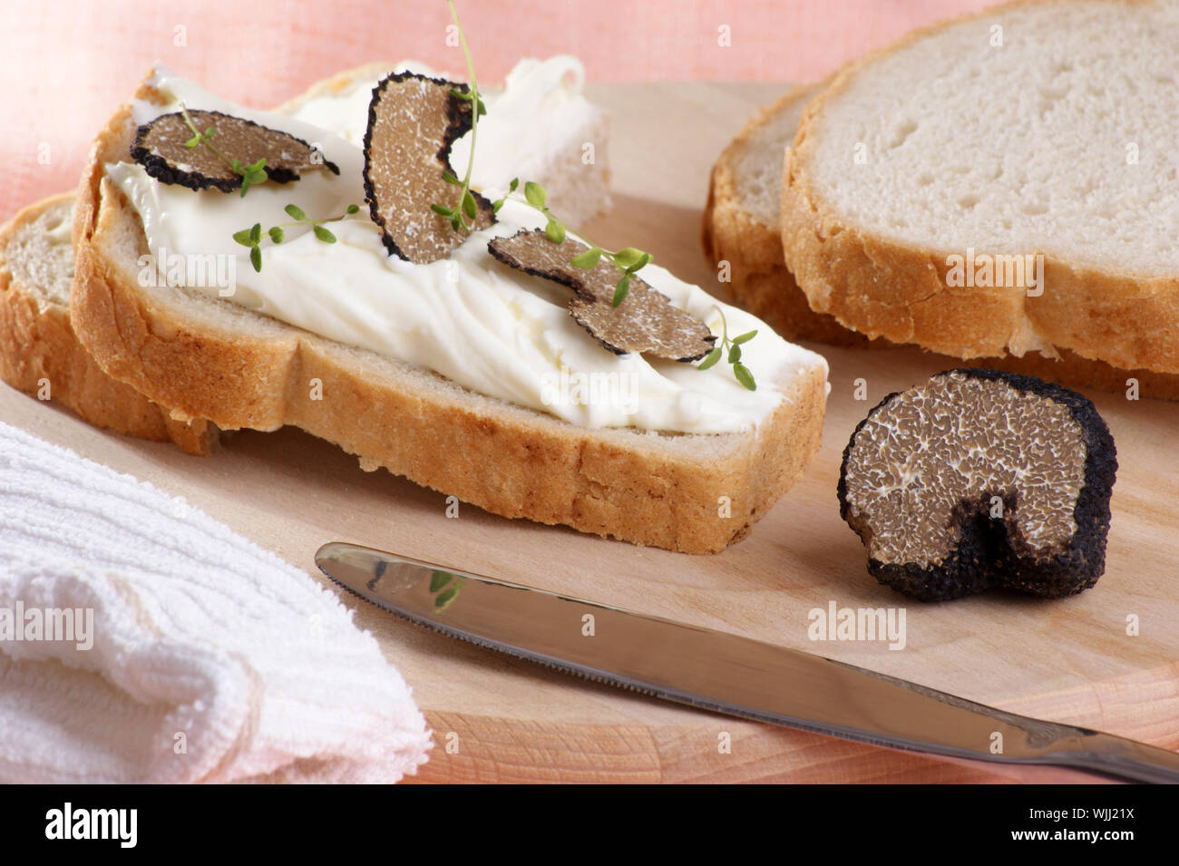 organic summer truffle with bread and spread cheese Stock Photo - Alamy