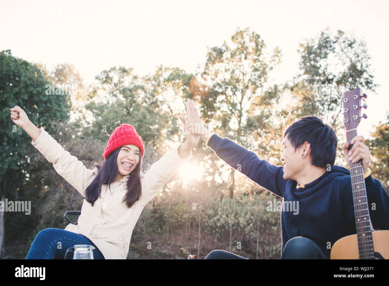 Happy high hi-res stock photography and images - Alamy