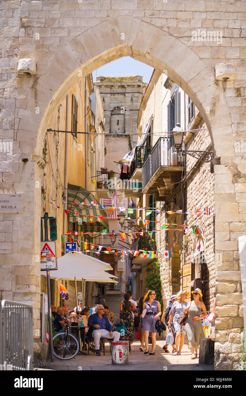 BARI, ITALY - JULY 11, 2018, View of a narrow street in Bari, Puglia ...