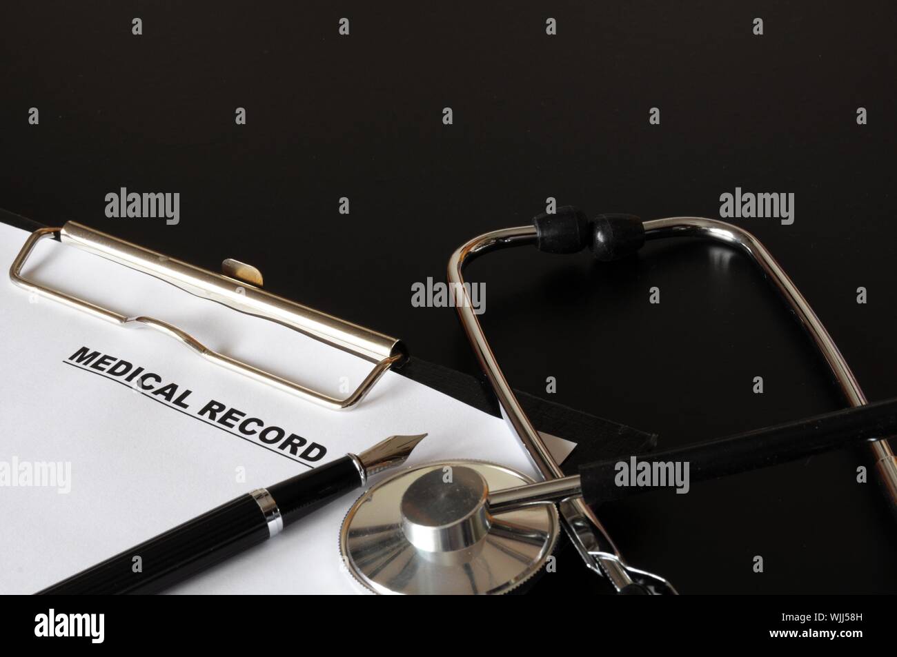 medical record clipboard and stethoscope showing health or medicine ...
