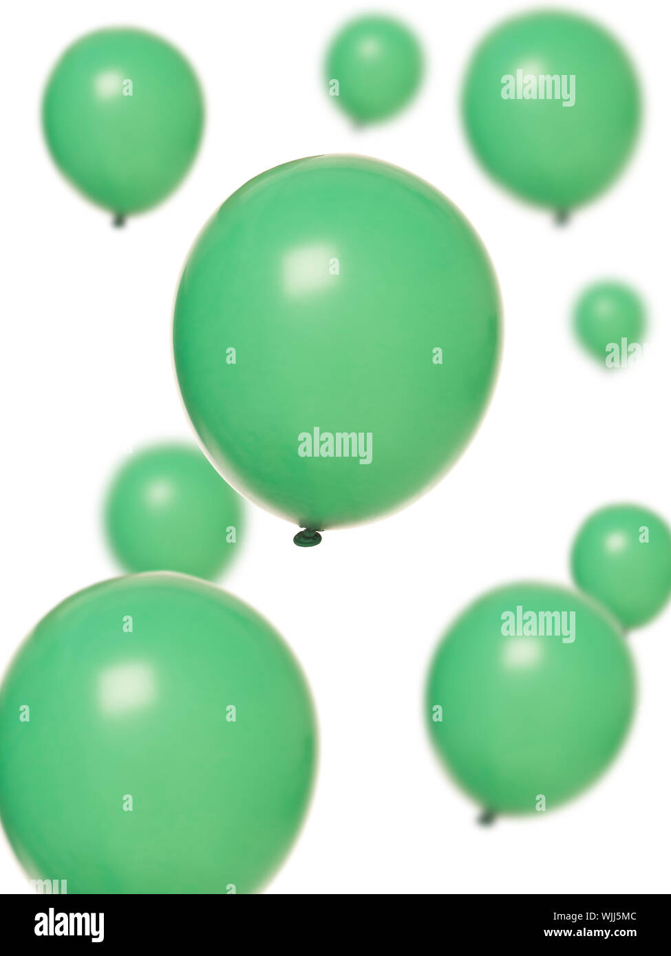 Green balloons isolated on white background Stock Photo - Alamy