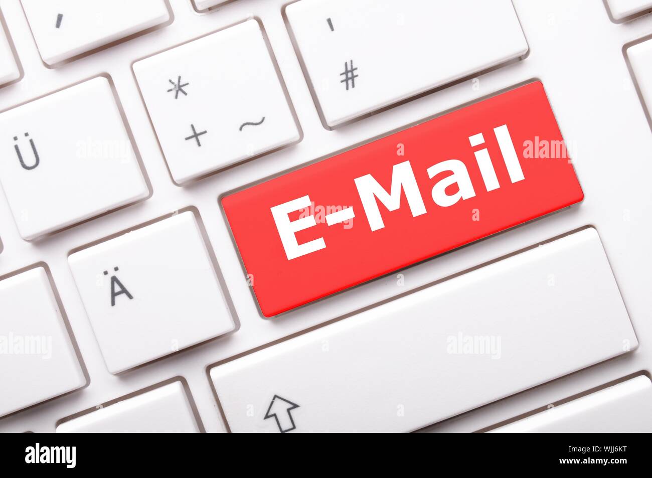 email e-mail or internet communication concept with key on keyboard ...