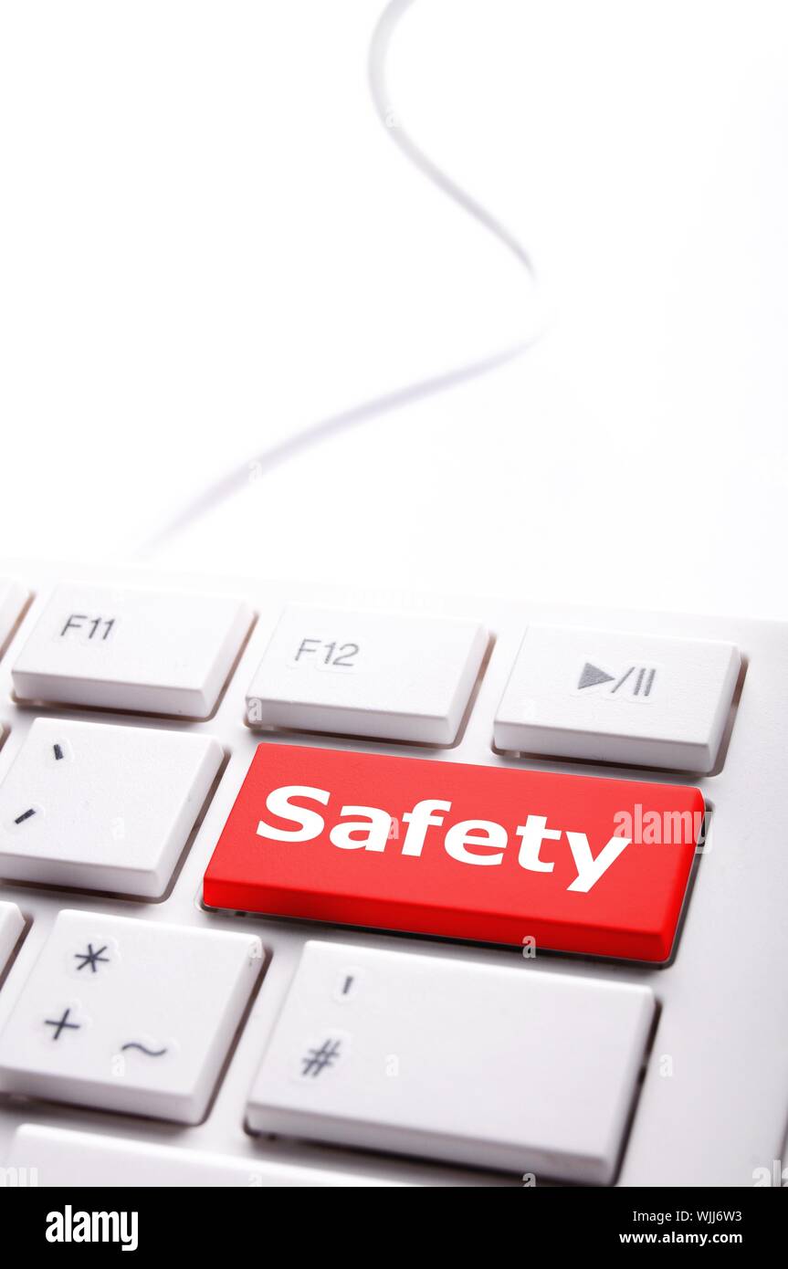 safety first on computer key showing security concept Stock Photo - Alamy