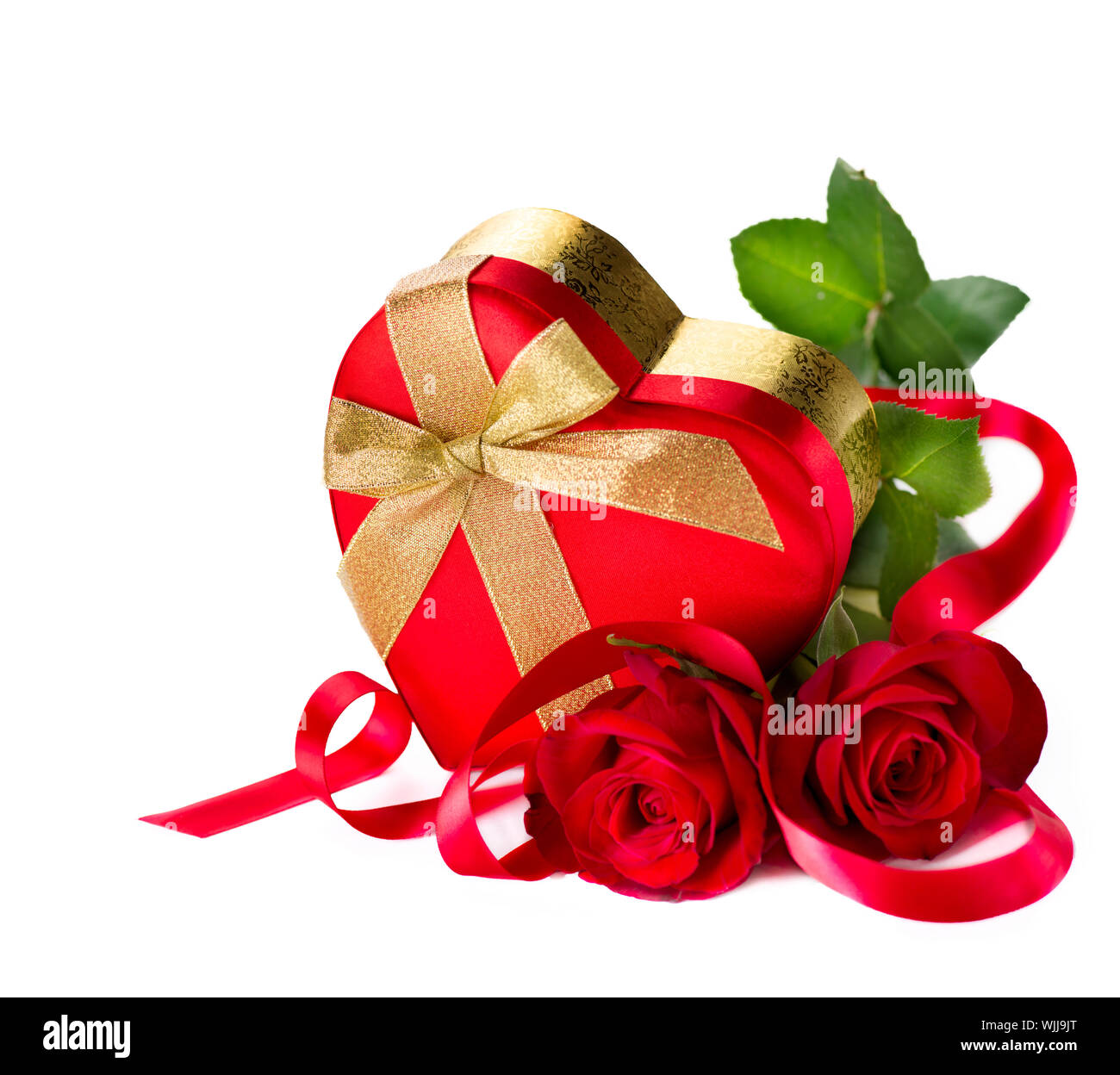Valentine Heart Shape Gift Box and red roses bouquet Stock Photo - Alamy