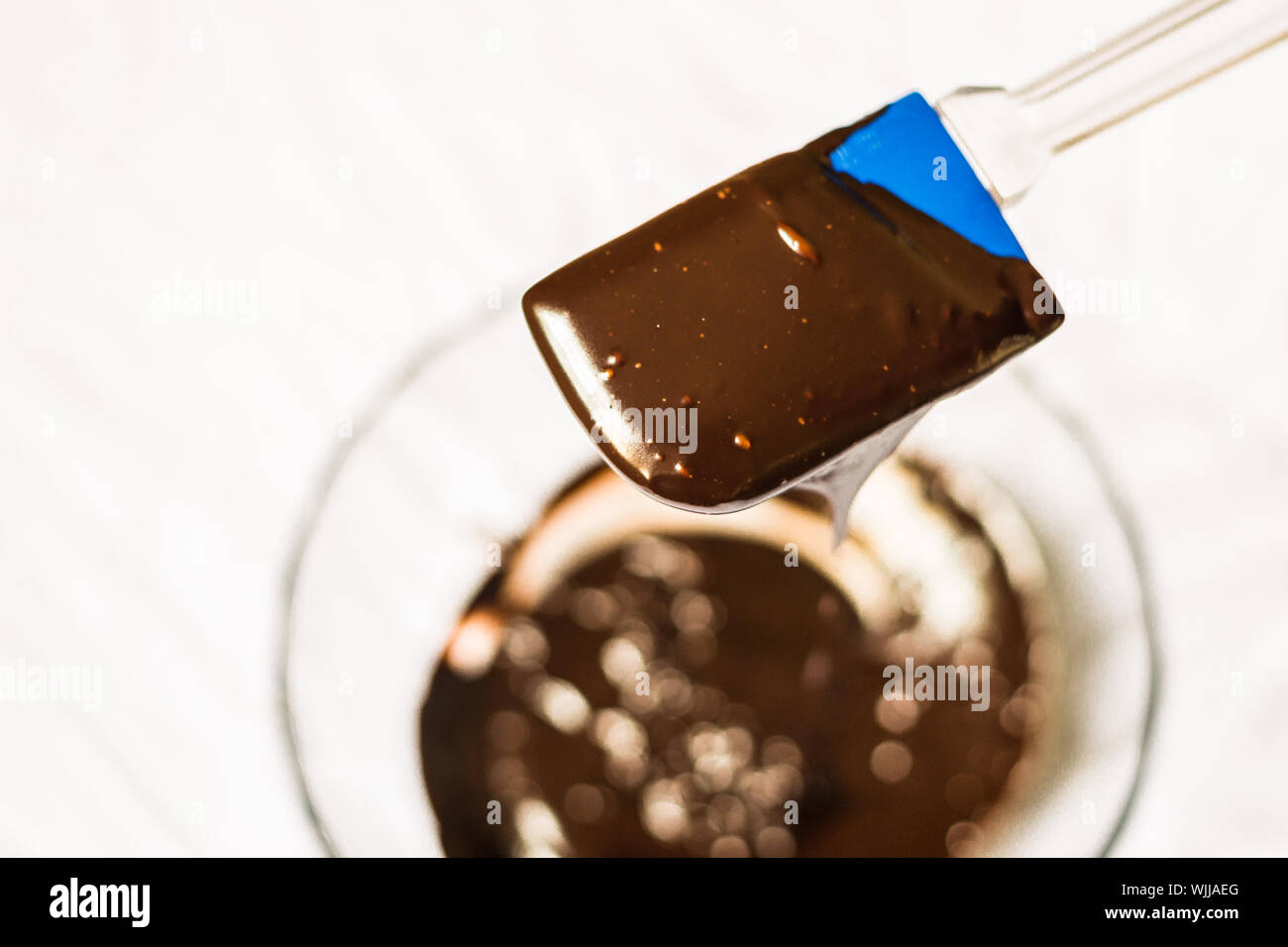 Melted chocolate ganache cream. Food background and pattern texture ...