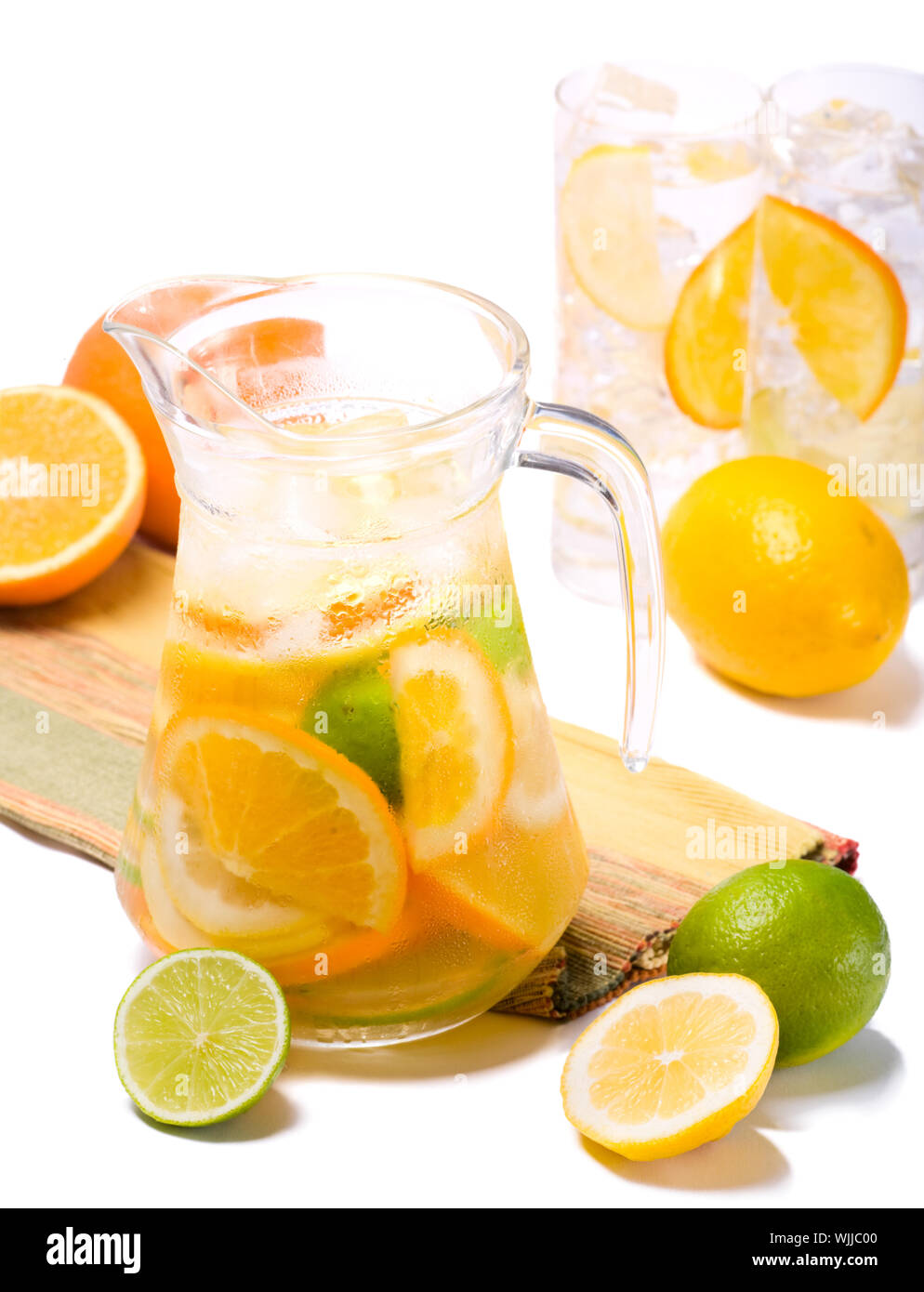 Citrus Ice Water. Lemon, lime, orange and carafe with citrus ice water ...