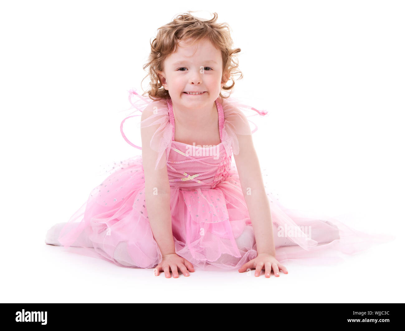 Cute curly haired girl in little fairy dress. Isolated on white Stock ... Cute curly haired girl in little fairy dress. Isolated on white Stock ...