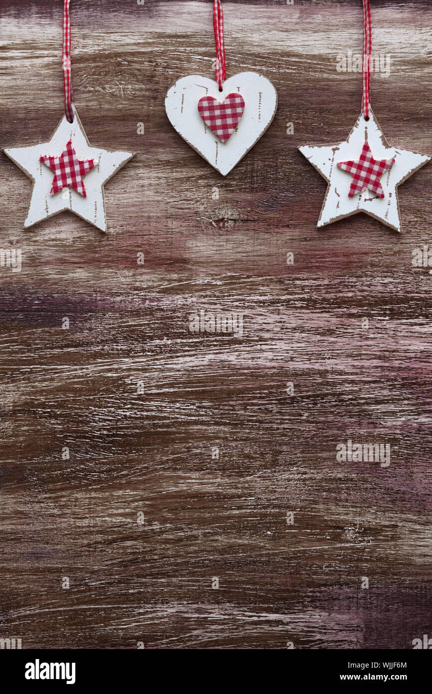 Shabby chic wooden shapes on vintage blue background Stock Photo - Alamy