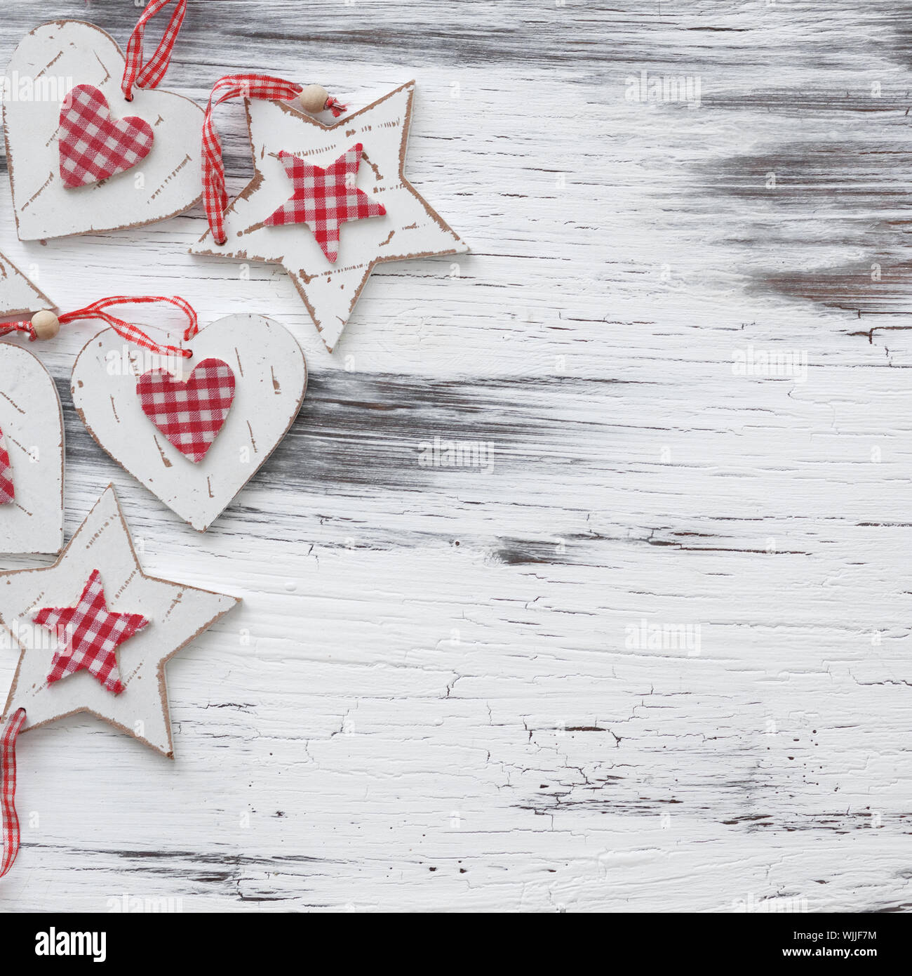 Shabby chic wooden shapes on vintage scratched background Stock Photo ...