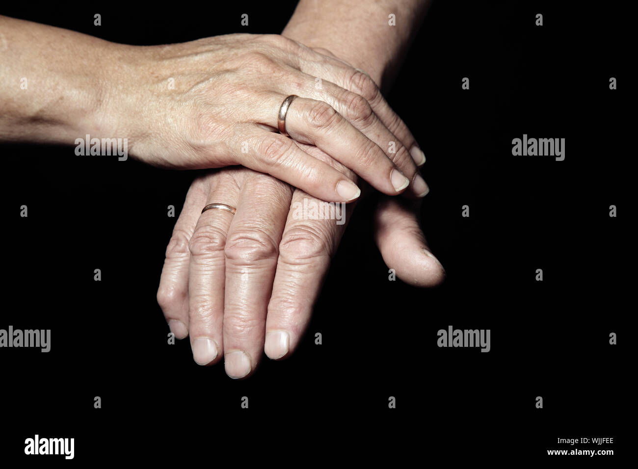 Senior hand wedding rings hi-res stock photography and images - Alamy