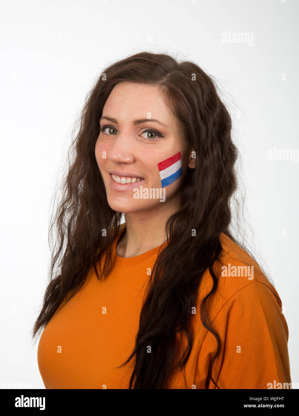 Young Girl with the Dutch flag painted in her face Stock Photo - Alamy