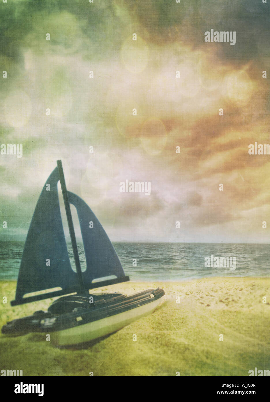 Plastic toy boat in sand hi-res stock photography and images - Alamy