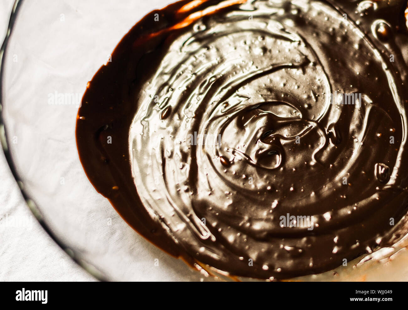 Melted chocolate ganache cream. Food background and pattern texture ...