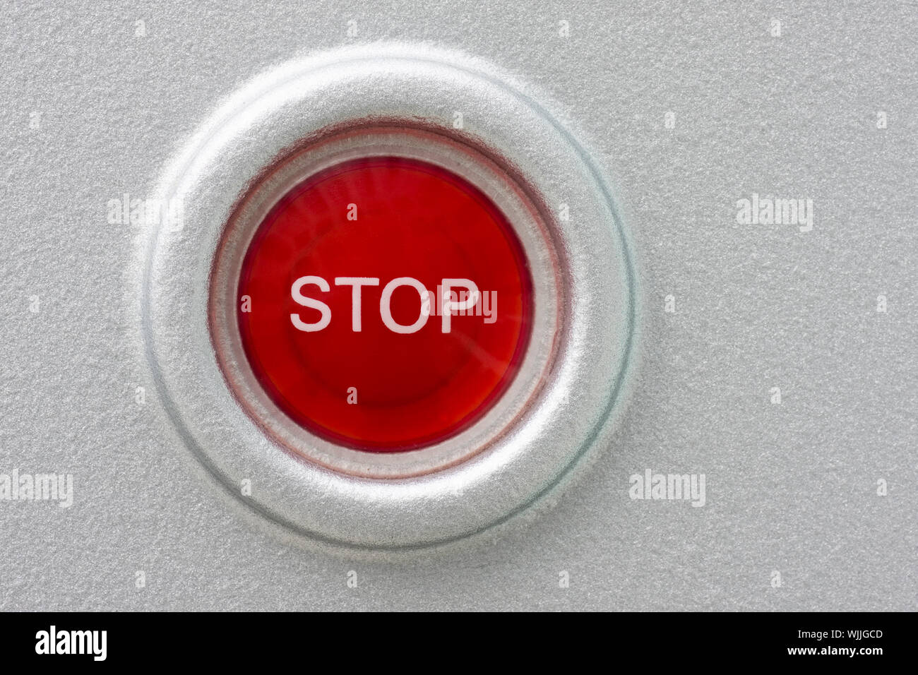 Round red stop button Stock Photo - Alamy