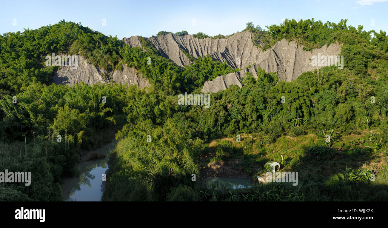 Badlands scenery with forest and small lake and river in Taiwan, Asia ...