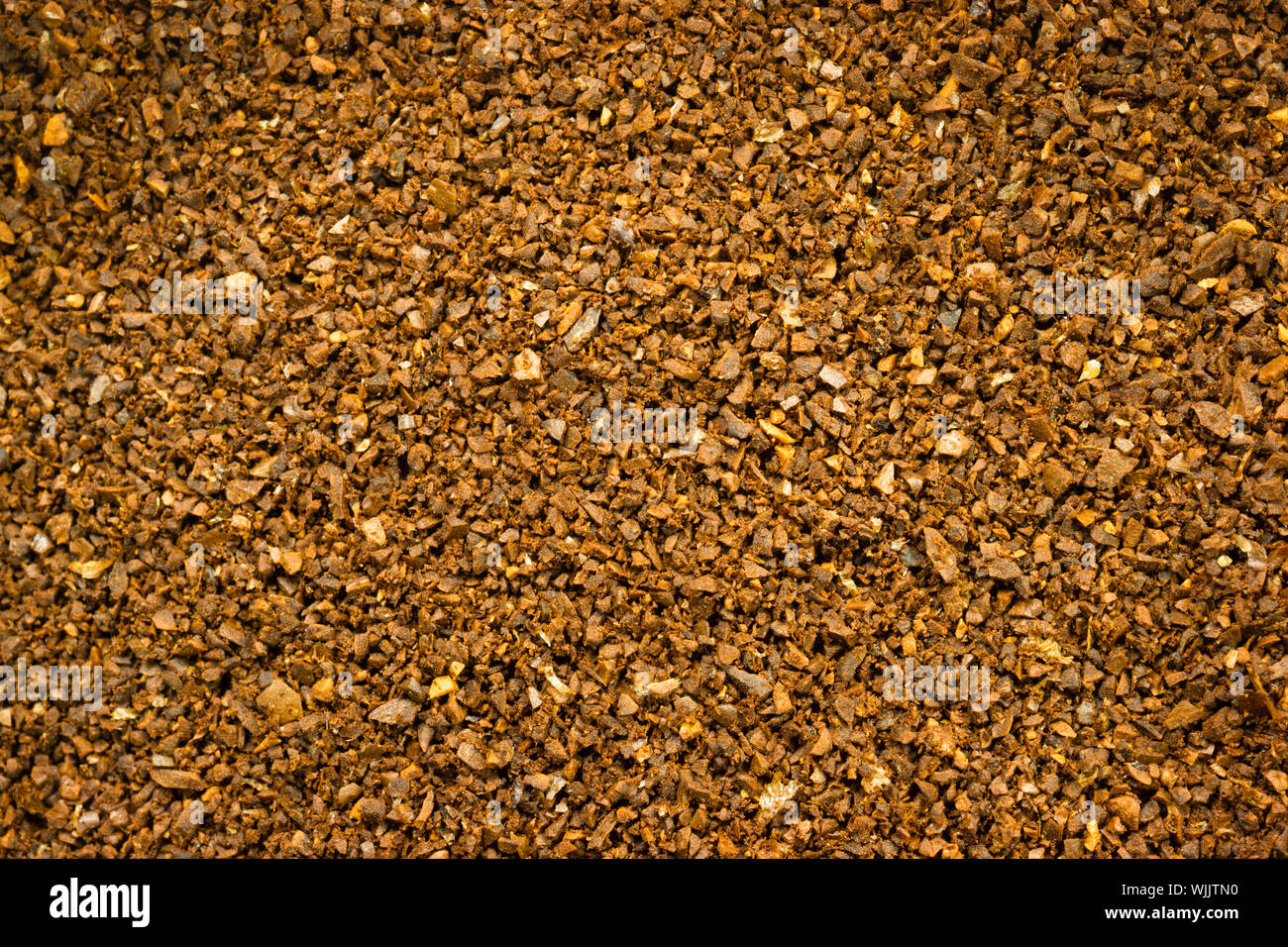 Big pile of generic ground black coffee Stock Photo - Alamy