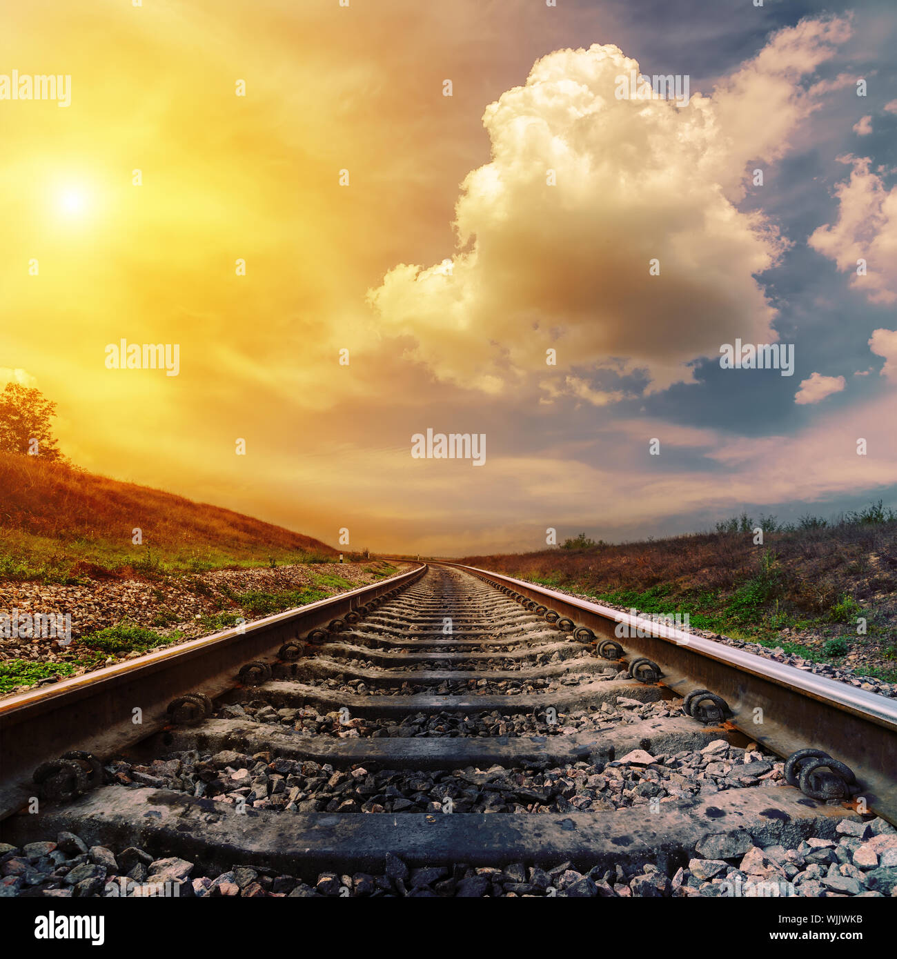 fantastic sunset over railroad Stock Photo - Alamy