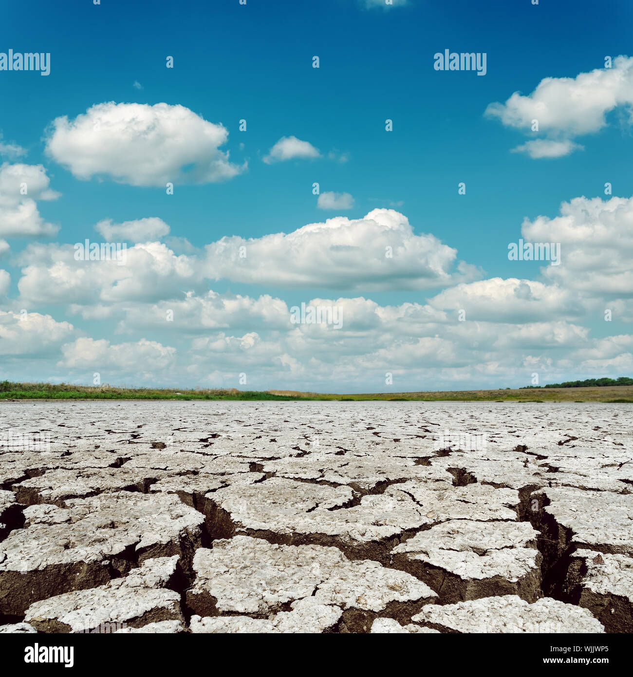 drought earth and dramatic sky with clouds Stock Photo - Alamy