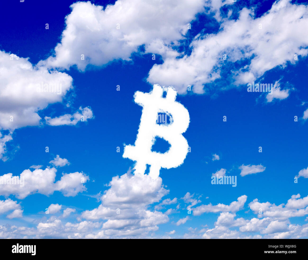 Bitcoin sign in clouds form with blue sky background Stock Photo - Alamy