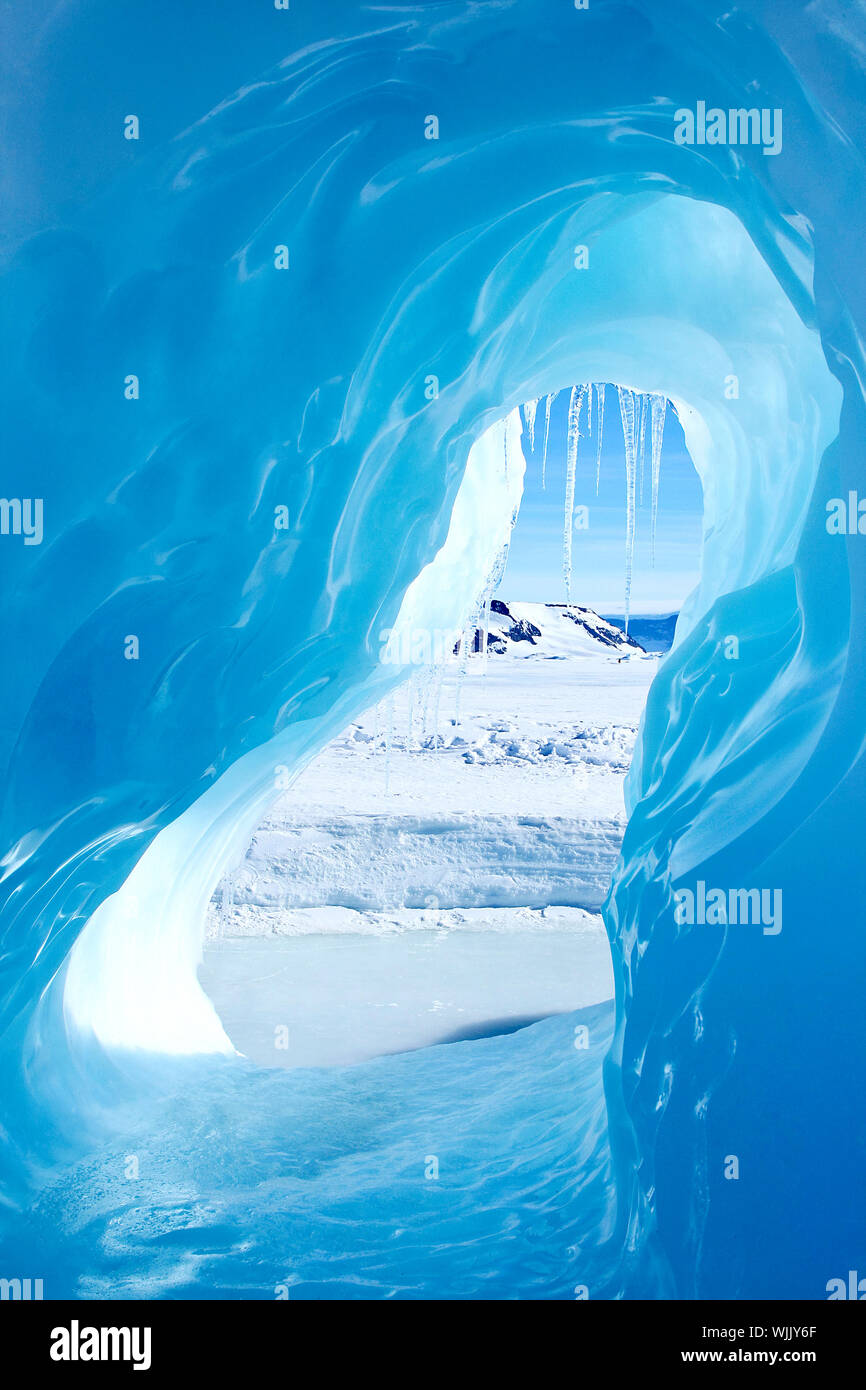 Small ice cave on Antarctica Stock Photo - Alamy