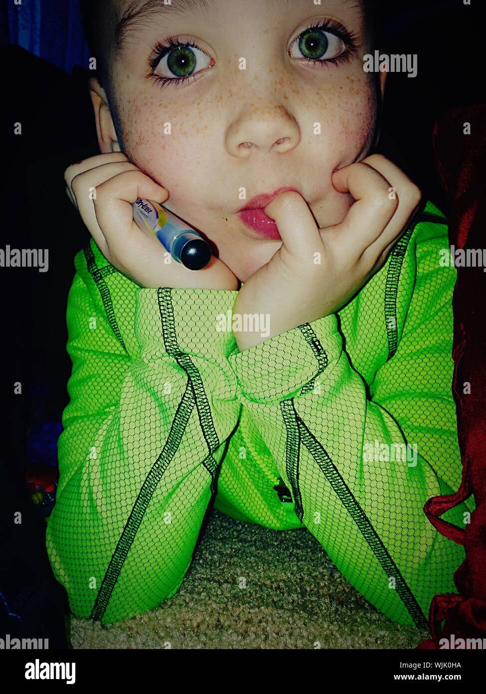 Boy with chin on floor hi-res stock photography and images - Alamy