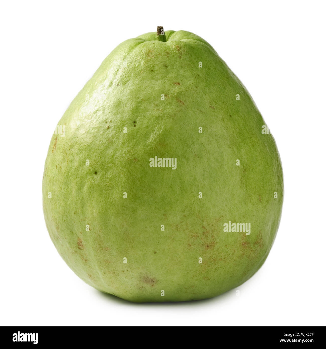 Single guava isolated against white, fruit with green color from ...