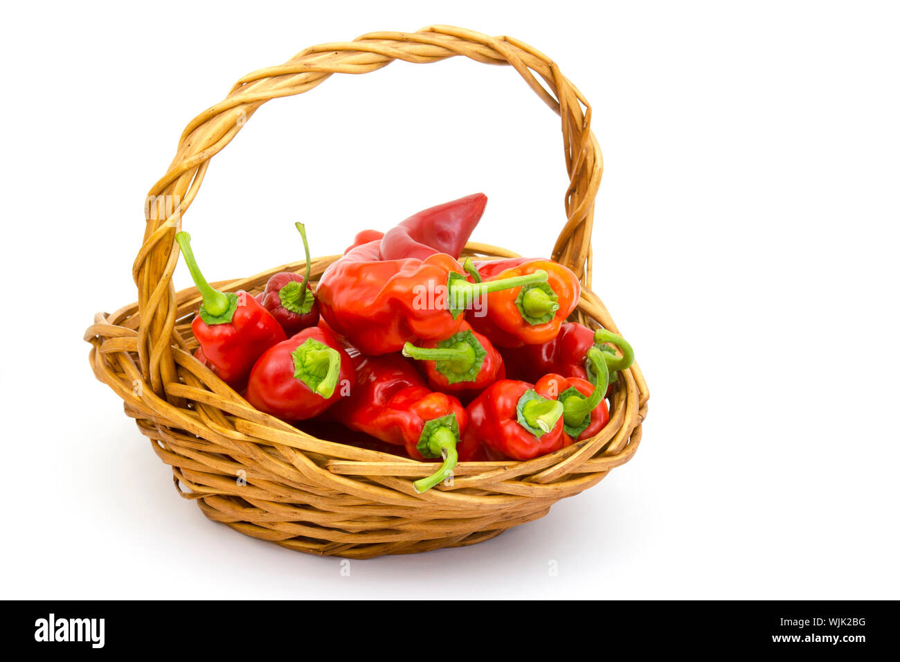 fresh peppers in a basket Stock Photo - Alamy